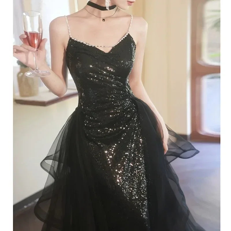 Elegant Black Sequin Evening Gown With Sheer Overlay on Luulla
