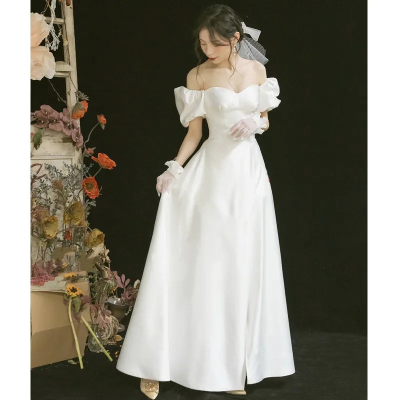 Elegant White Split-hem Bridal Gown With Puff Sleeves on Luulla