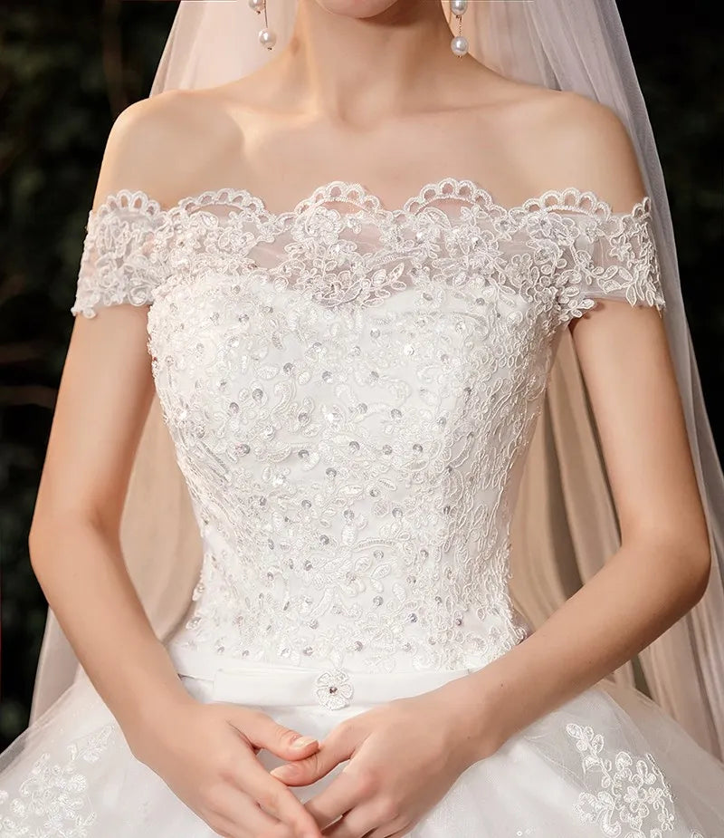 Elegant Off-shoulder Lace Bridal Gown With Train on Luulla