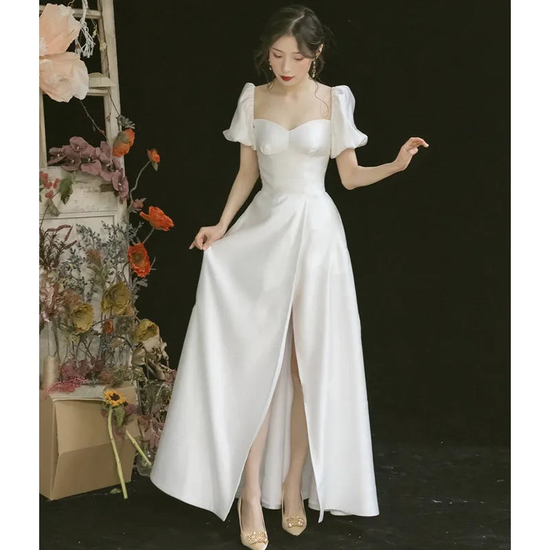 Elegant White Split-hem Bridal Gown With Puff Sleeves on Luulla